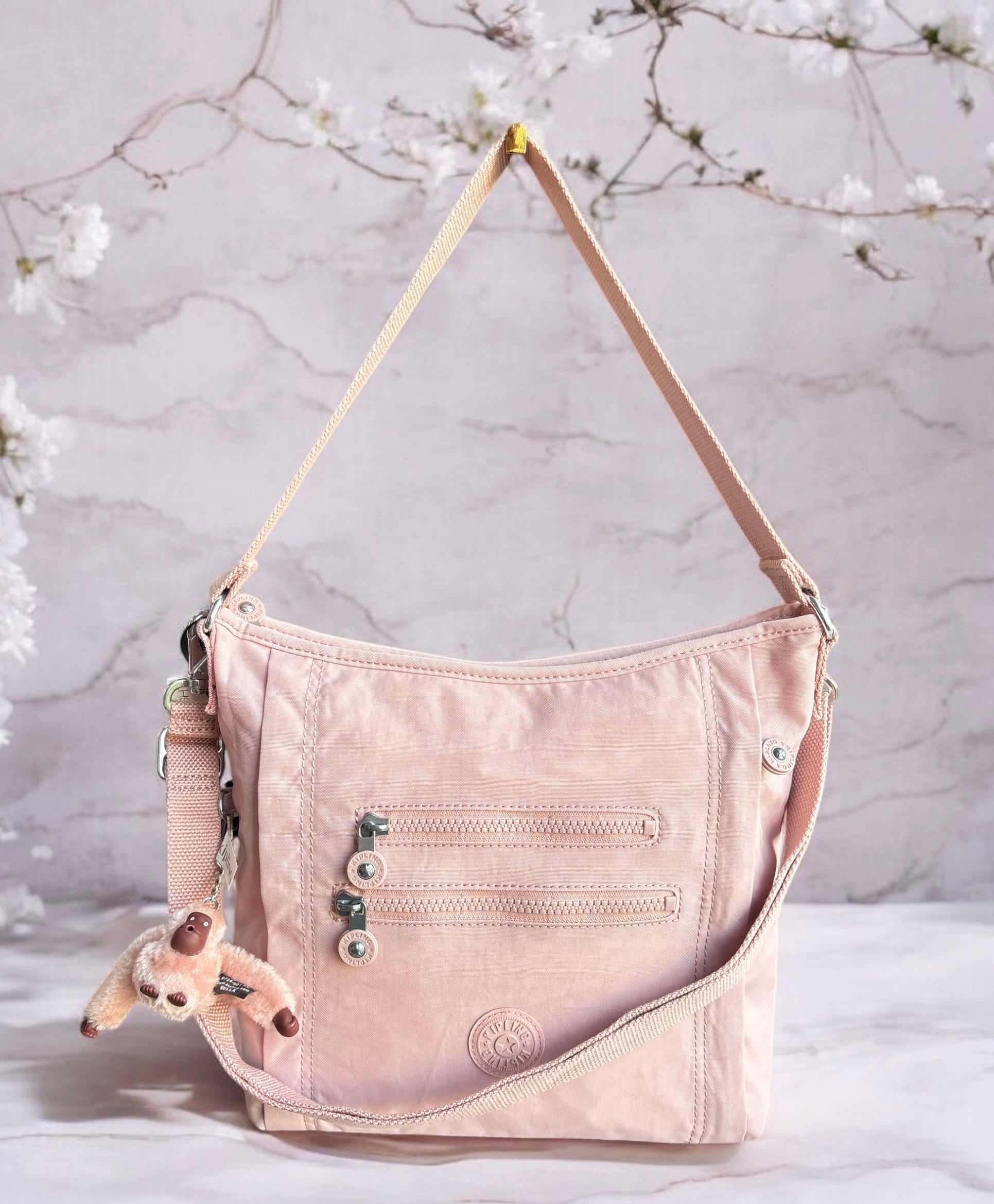 Crossbody/Hobo Kipling coral con changuito coral – BGC Trends